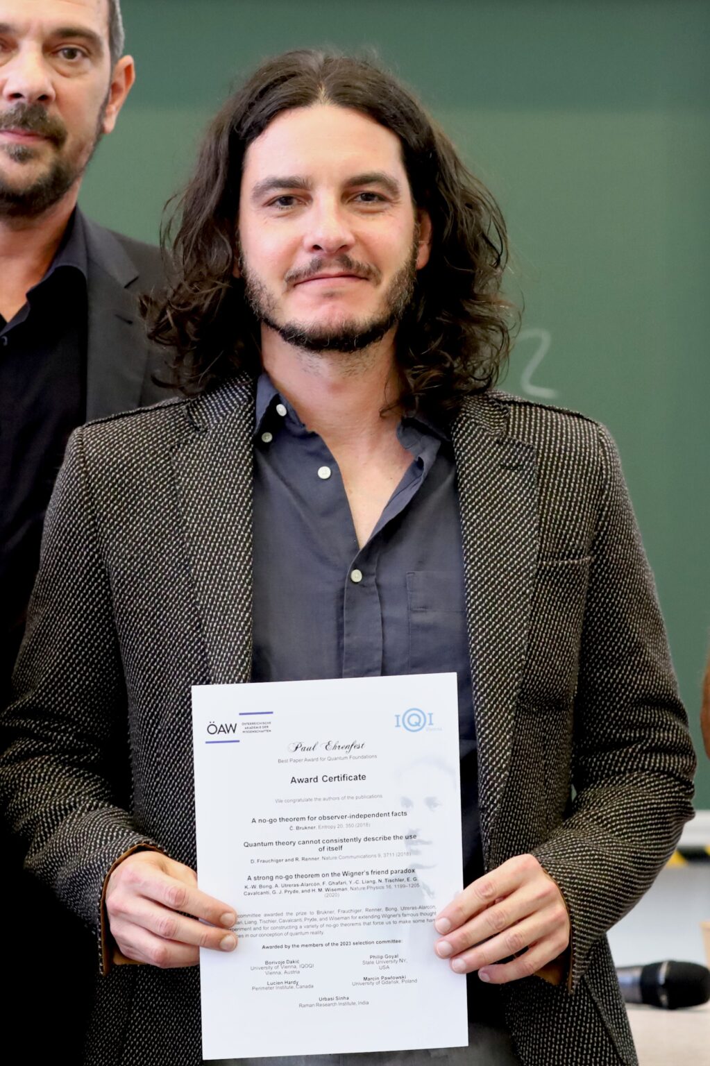 Griffith brings home top award for quantum physics paper - Griffith News